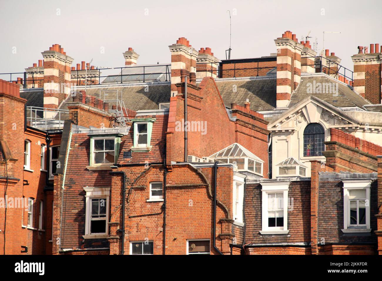 A beautiful view of apartment buildings with small windows in the ...