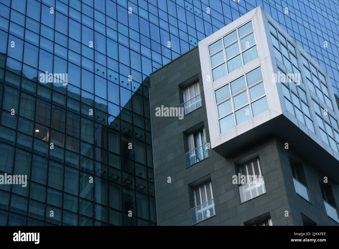 A view of a modern building with reflective windows in the Bilbao Stock ...
