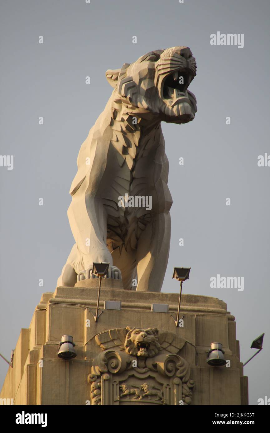 A vertical shot of a stone lion statue in Bilbao, Spain Stock Photo - Alamy
