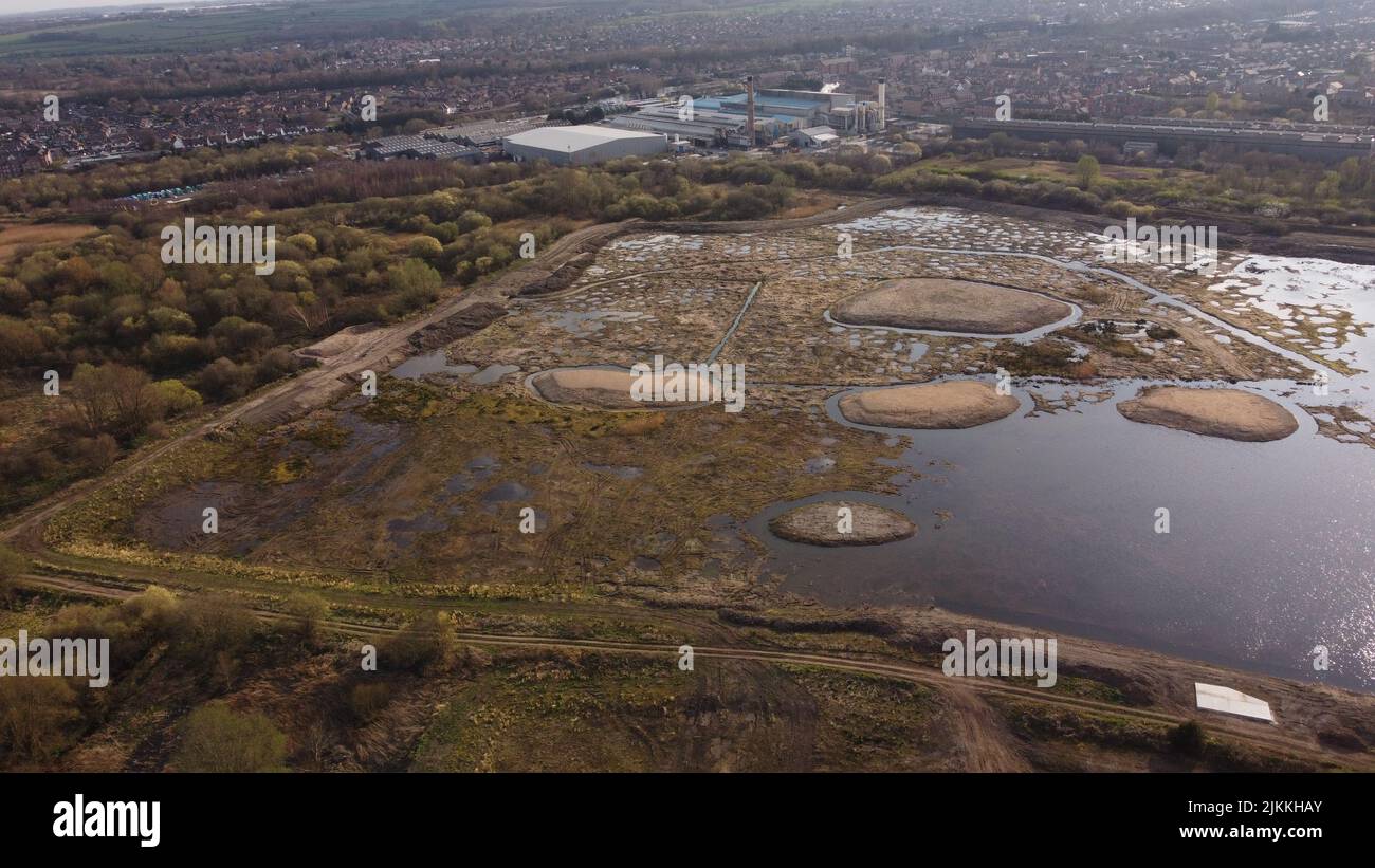 An aerial view of wetlands surrounded by dry plants Stock Photo - Alamy