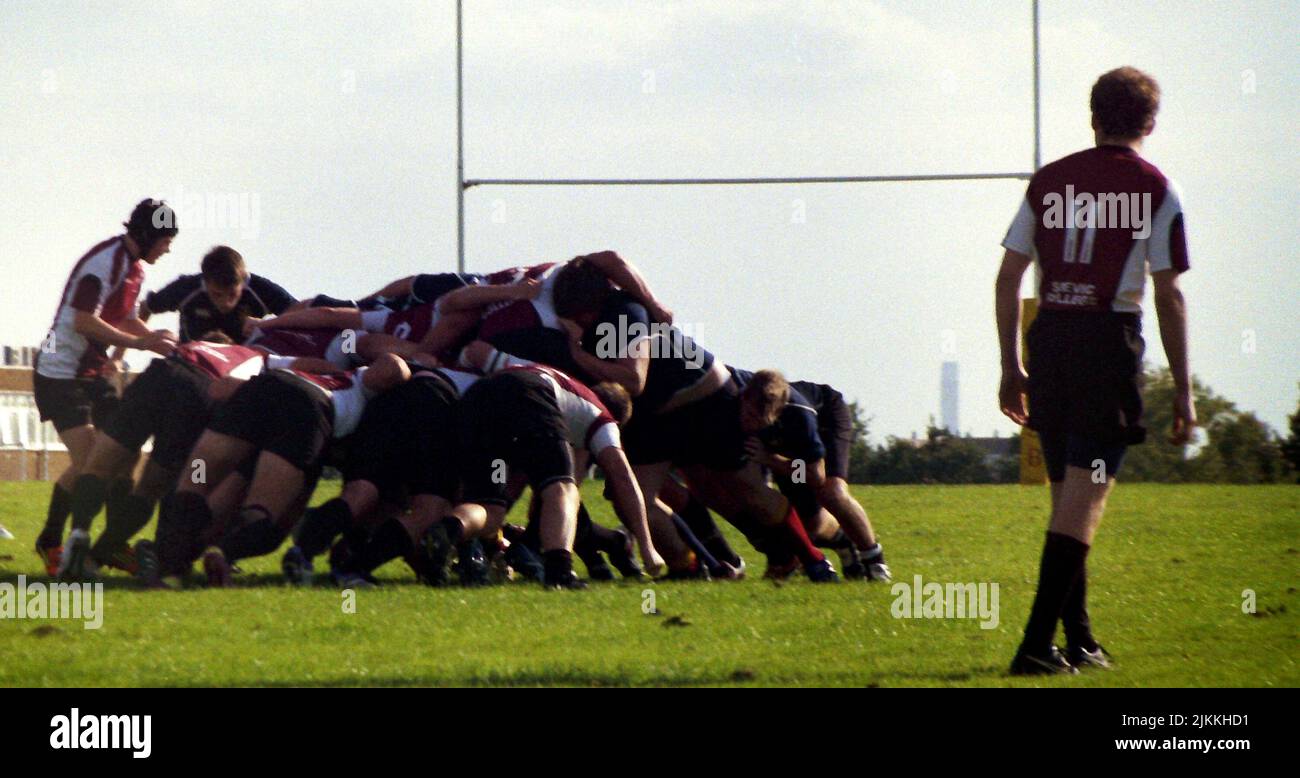 A beautiful shot of the Sixth Form Rugby Game scrum with the team in ...