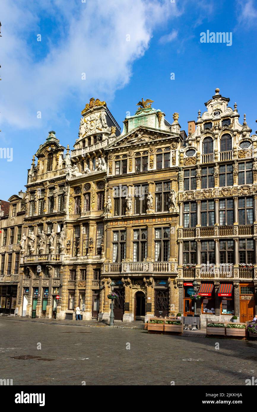 A vertical shot of the facade of a historical building in Grand Place ...