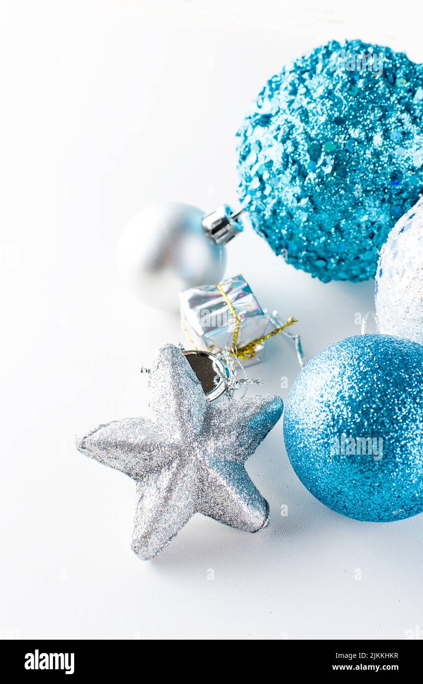 Christmas background. gift box, blue and silver balls, star and toys ...