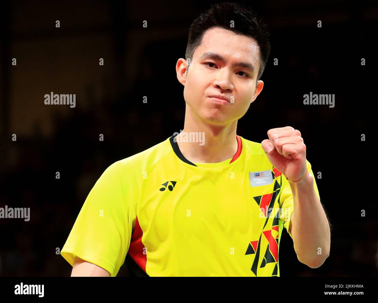 Malaysia’s Wooi Yik Soh celebrates winning a point in the Badminton ...