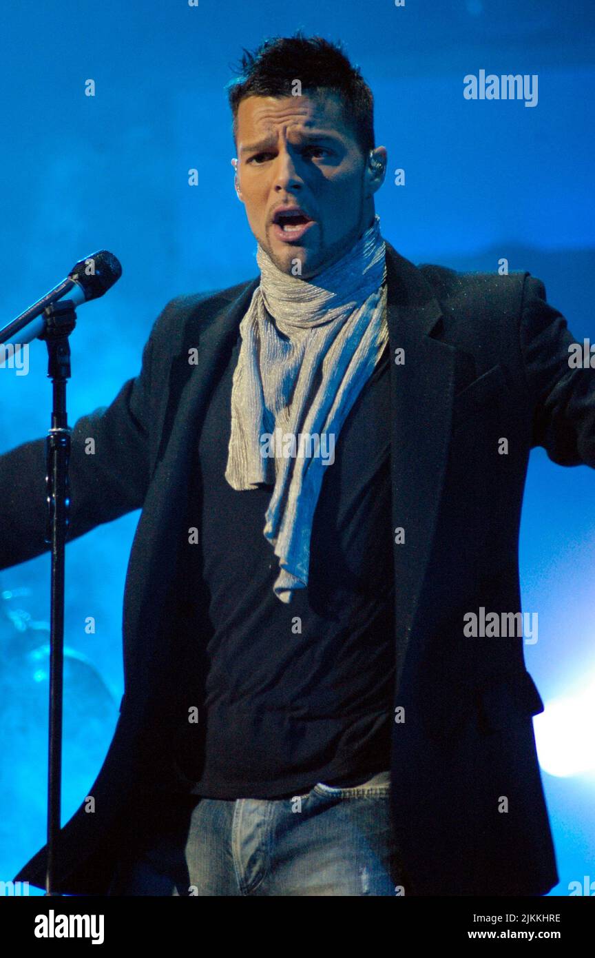 A vertical shot of legendary singer Ricky Martin performing live at the ...