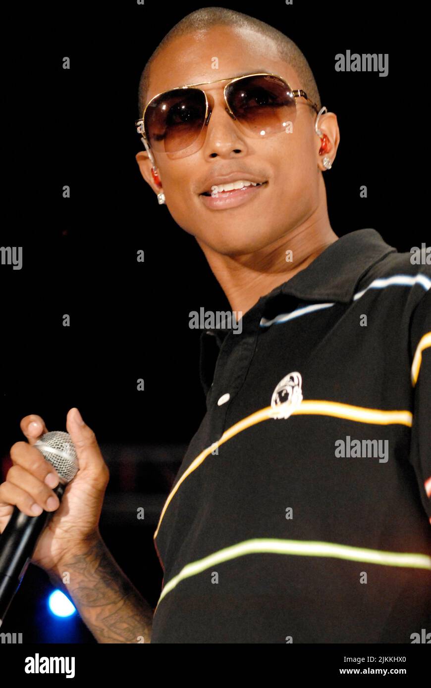 A Pharrell Williams performing live in Los Angeles in Hollywood in a ...