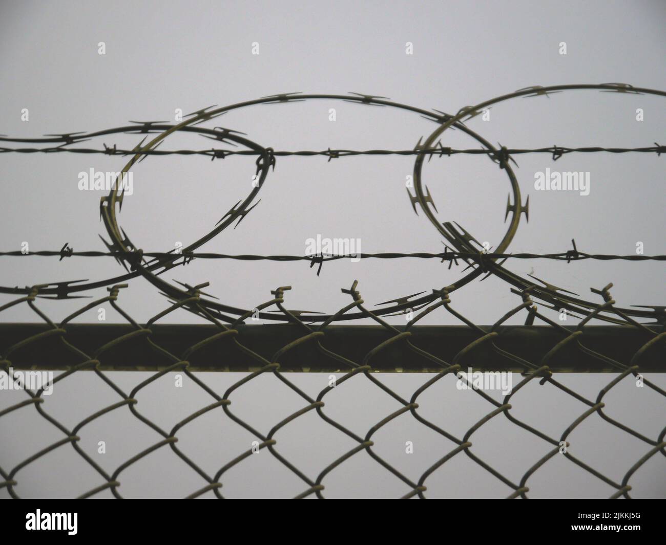 Barbed wire dangerous fence hi-res stock photography and images - Alamy