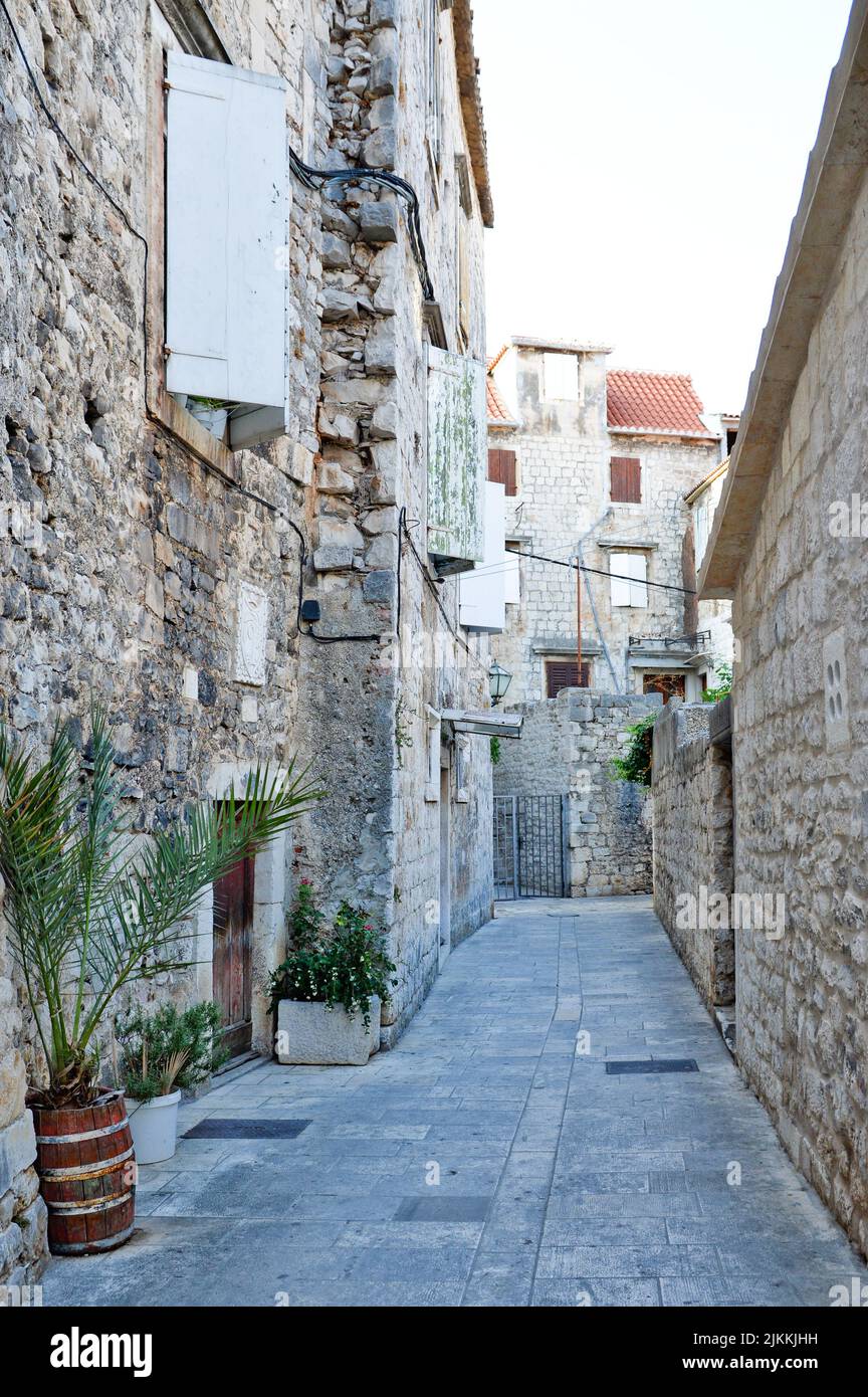 A small street in the medieval quarter of Trogir, an old Croatian town ...