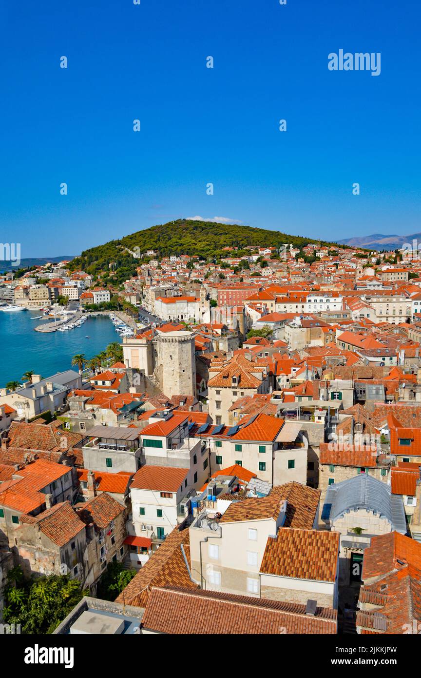 A vertical shot of beautiful buildings on a shore in Split, Croatia ...