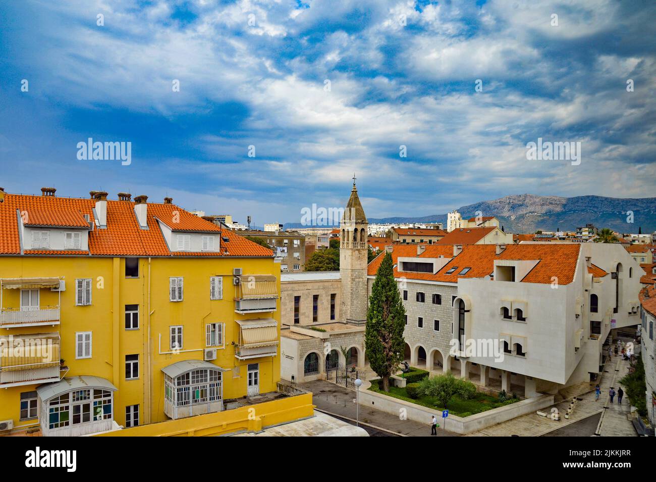 The beautiful cityscape of Split in Croatia against a blue cloudy sky ...