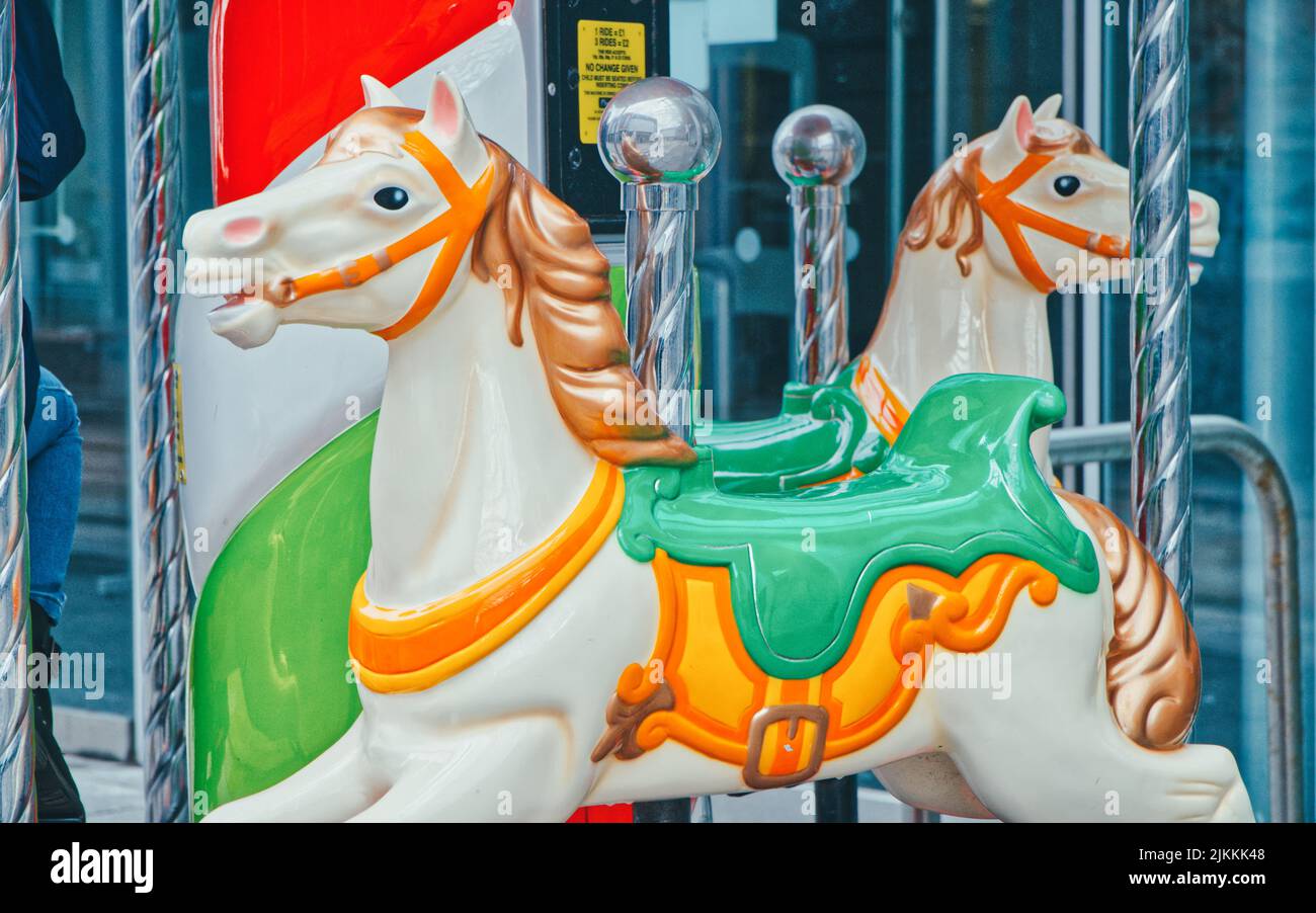 Merry go round horses hi-res stock photography and images - Alamy