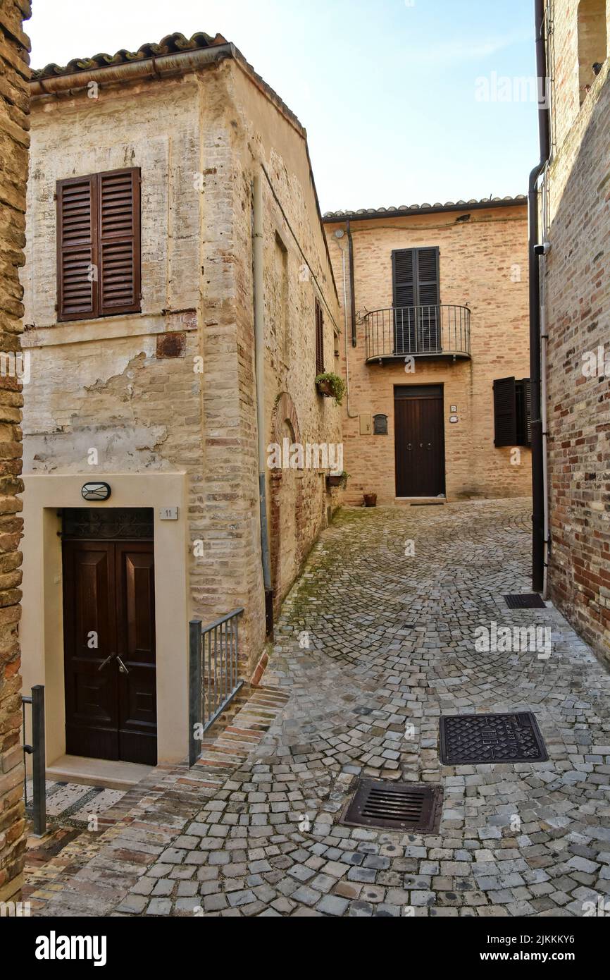 A vertical shot of narrow street of Civitanova Alta, a medieval town in the Marche region of ...