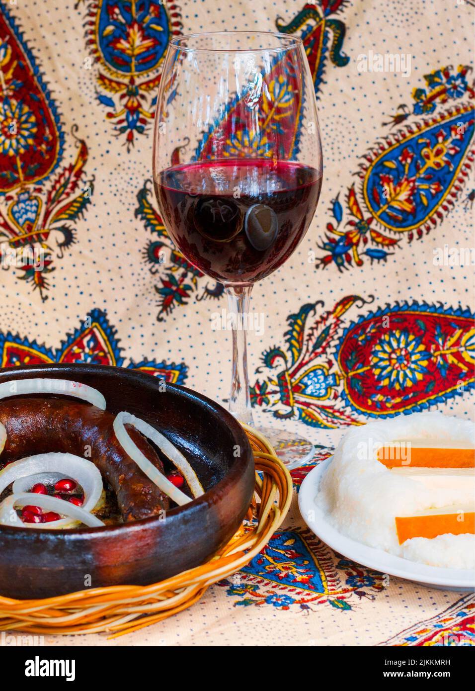 A vertical closeup of Georgian traditional food Kupati, sausage made ...