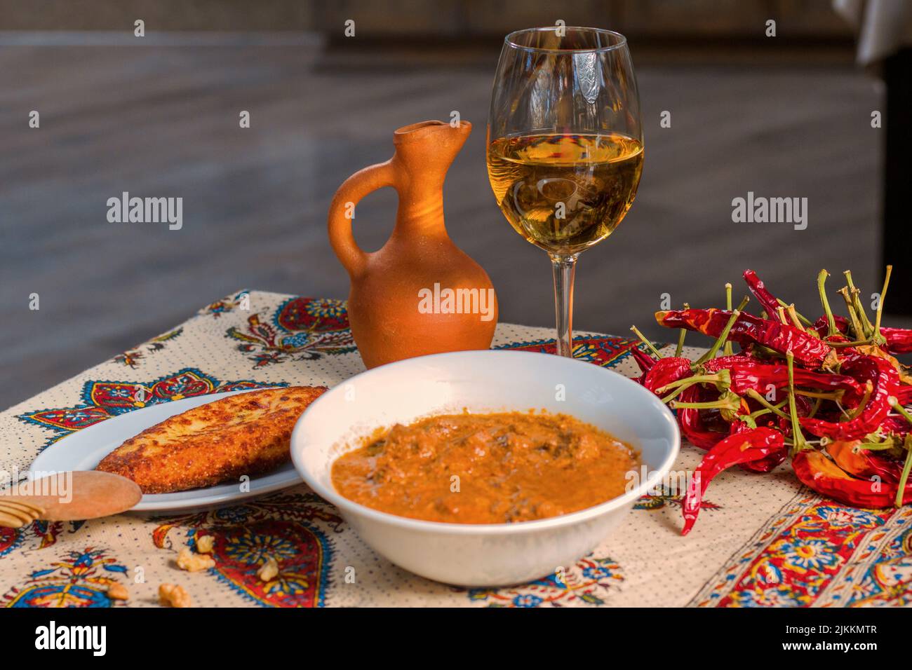 Georgian traditional food soup Kharcho or walnuts souse with beef meal ...