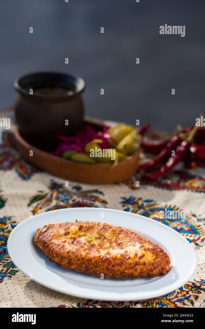 Georgian traditional food Chvishtari, corn meal with cheese and corn ...
