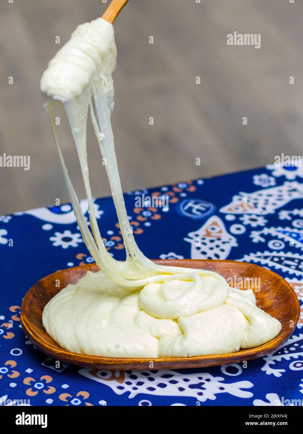 Georgian traditional food Elarji, meal with cheese and corn, baked and ...