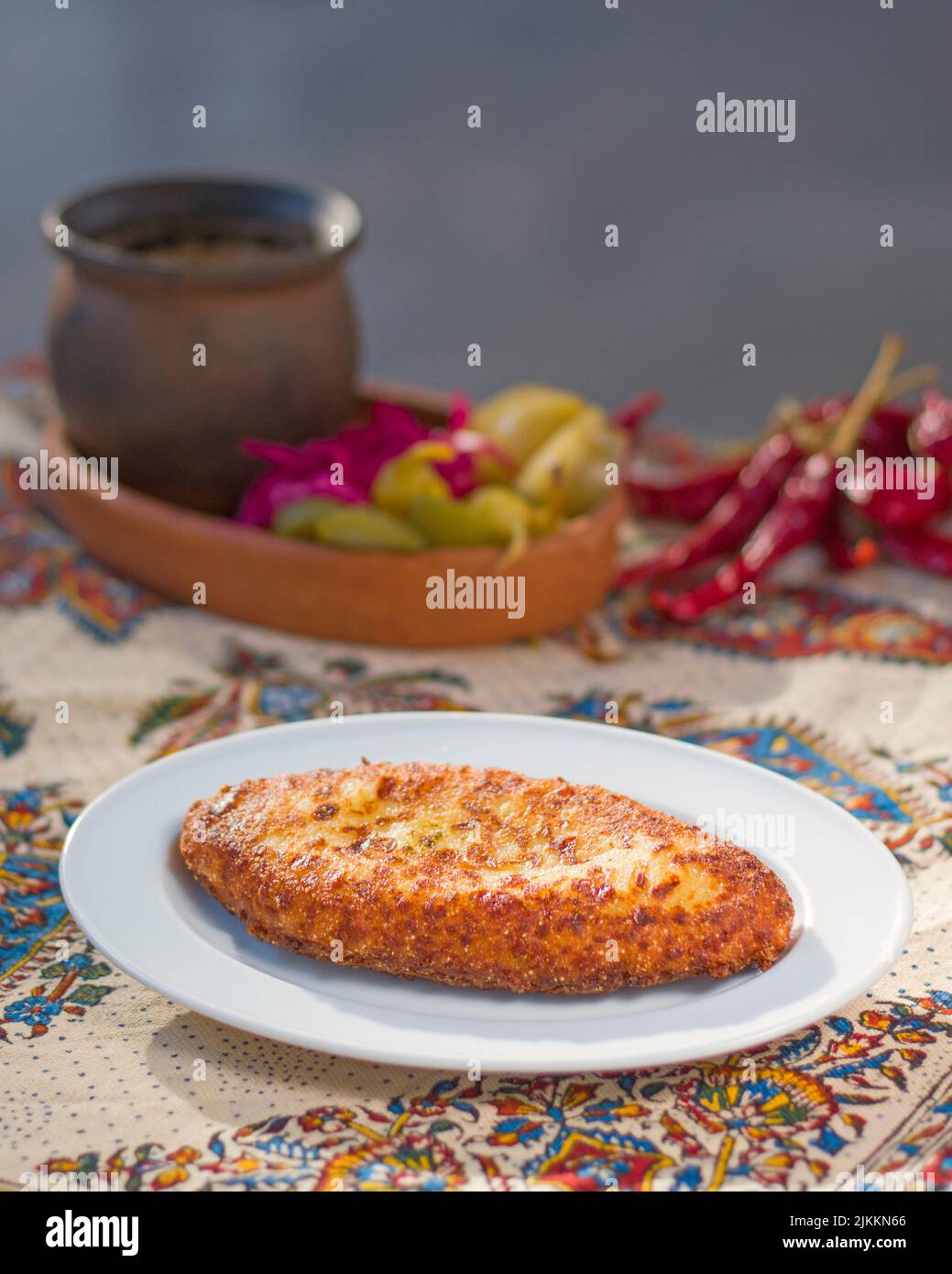 Georgian traditional food Chvishtari, corn meal with cheese and corn ...