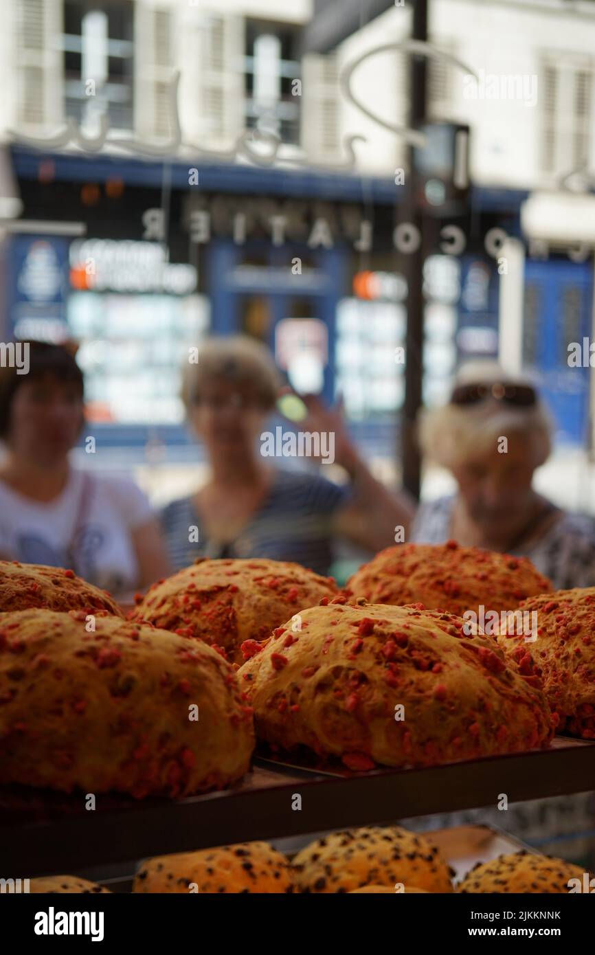 French buns on window display Stock Photo - Alamy