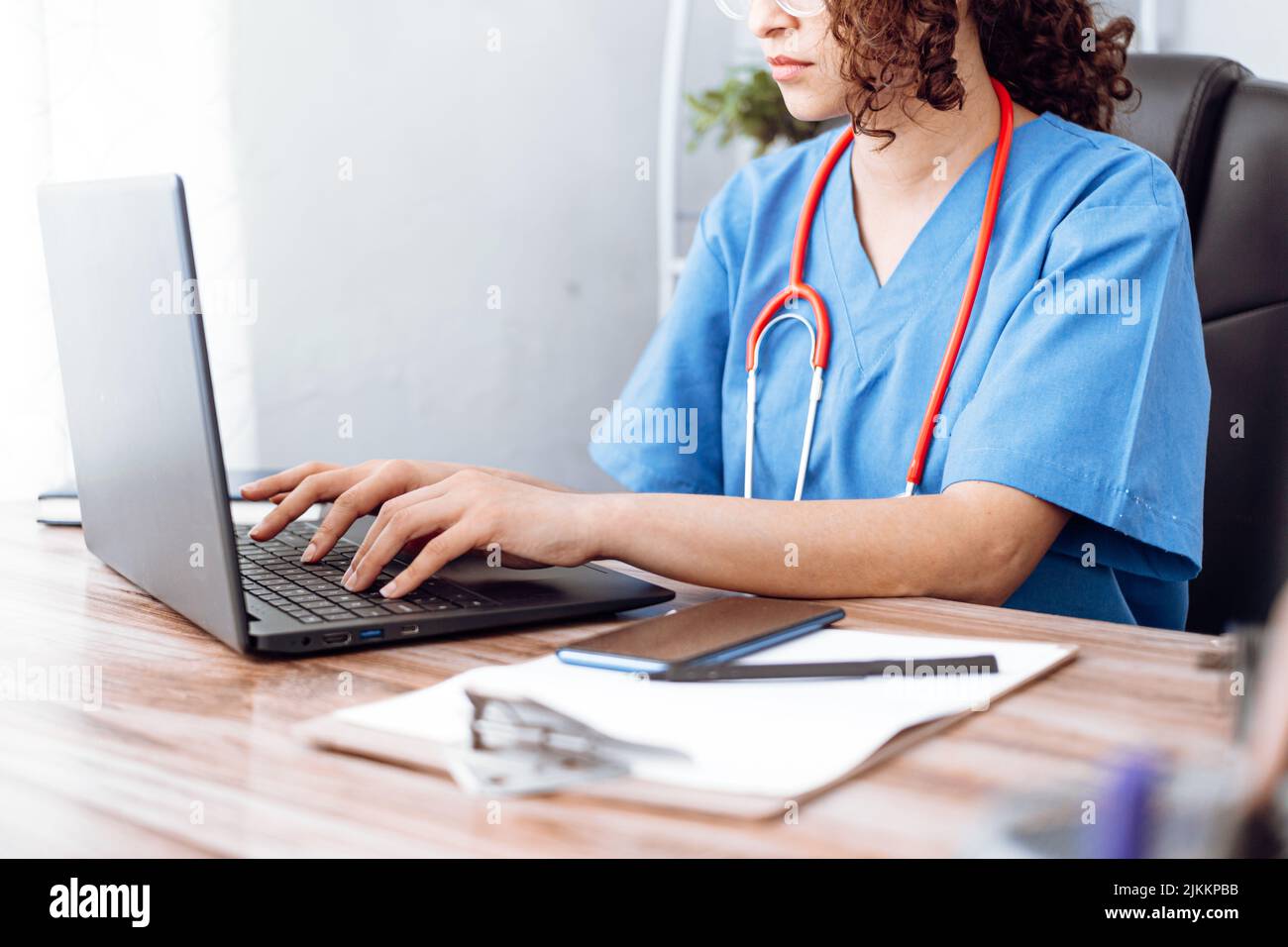 doctor using computer, nurse work on laptop Stock Photo - Alamy