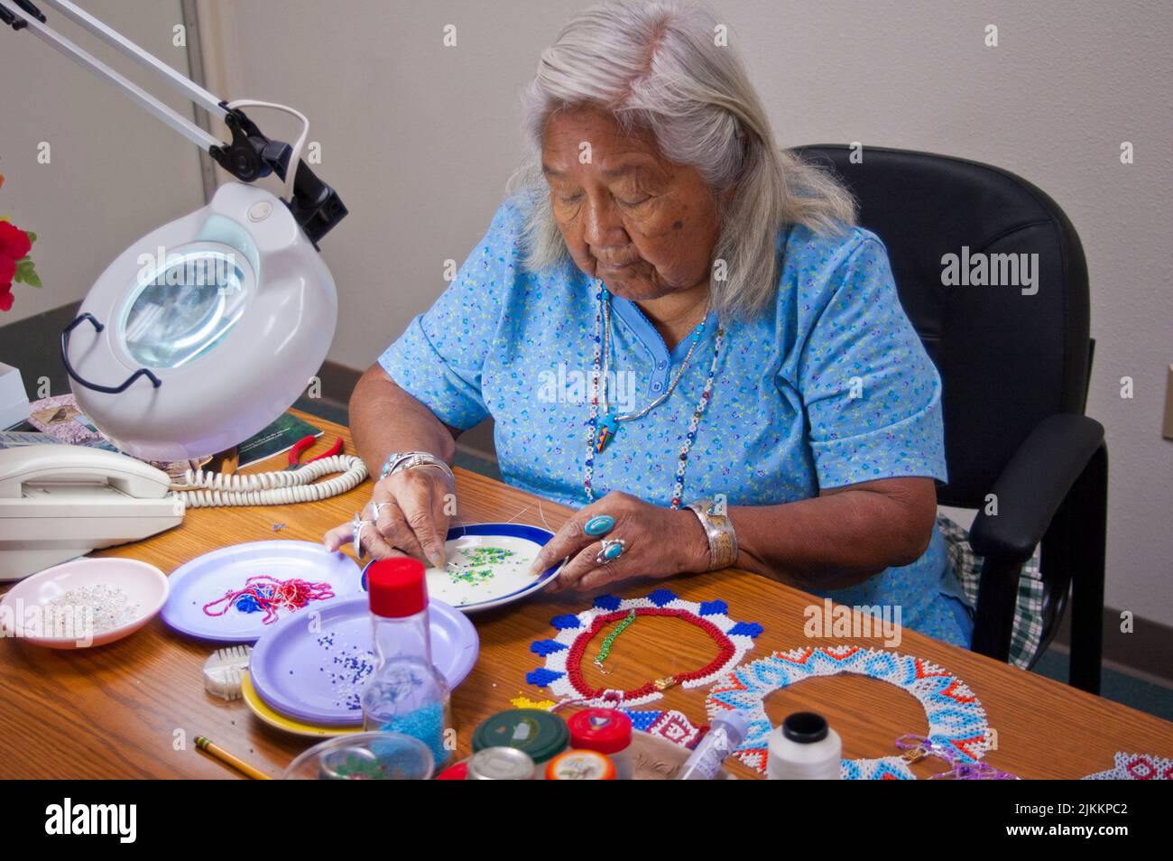 Senior citizen and Mojave tribal member demonstrates traditional ...