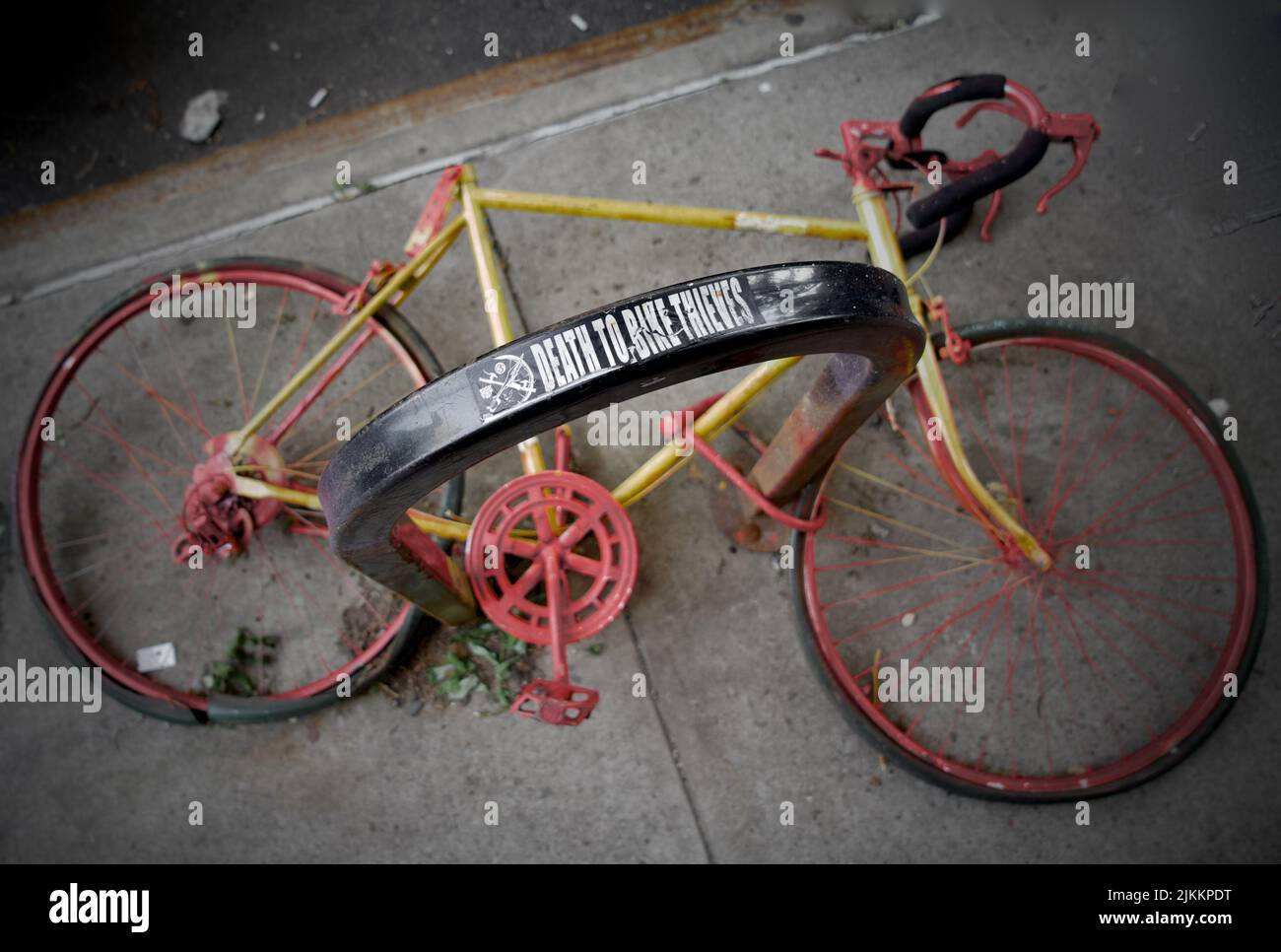 A view of a broken bicycle left for thieves Stock Photo - Alamy