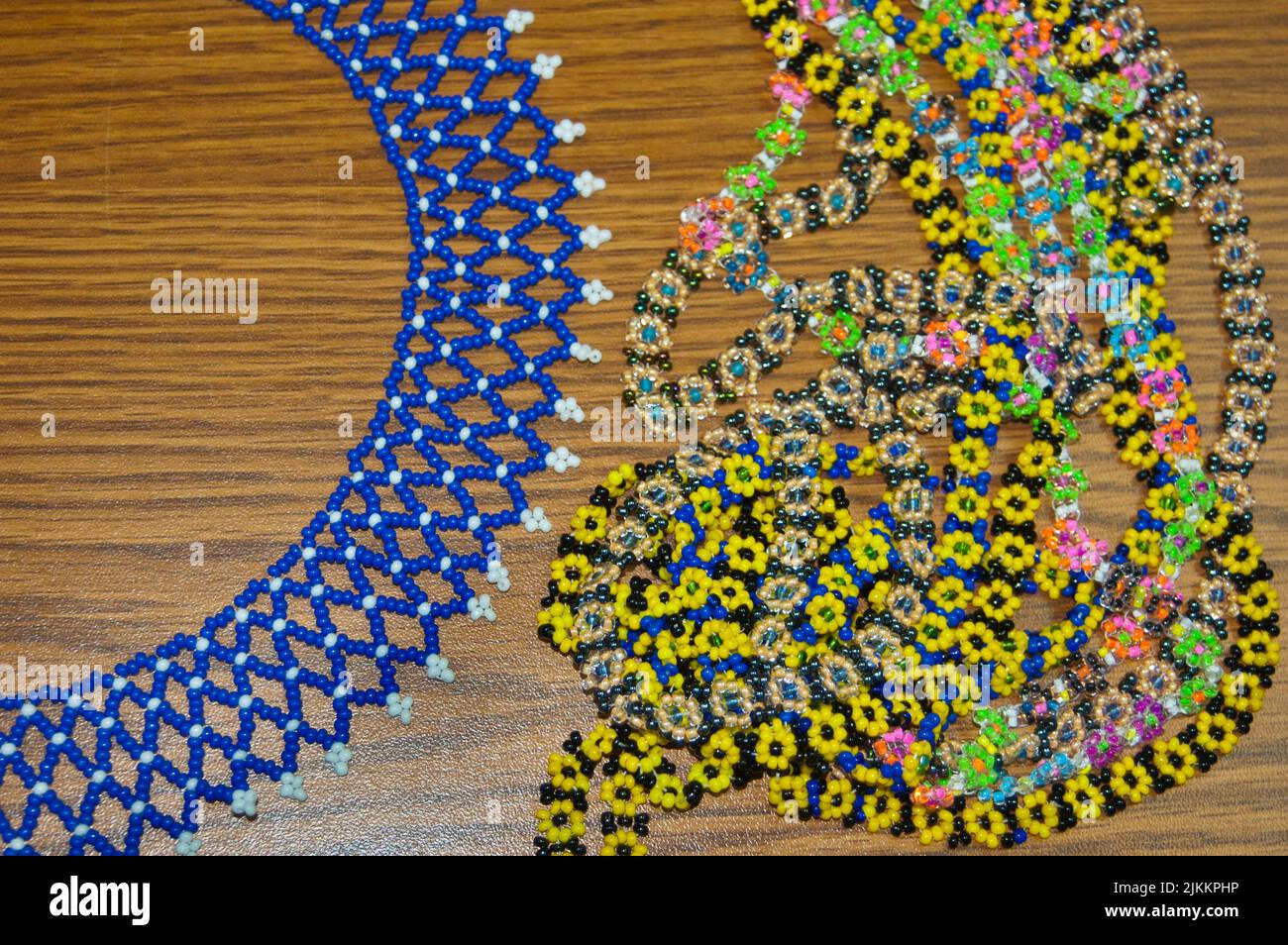 Beaded necklaces display the intricate traditional daisy chain beadwork ...