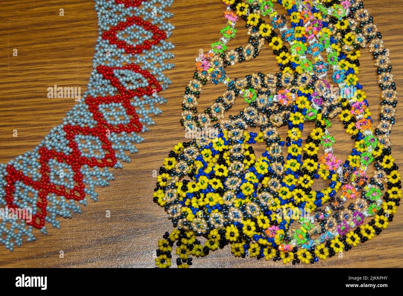 Beaded necklaces display the intricate traditional daisy chain beadwork ...