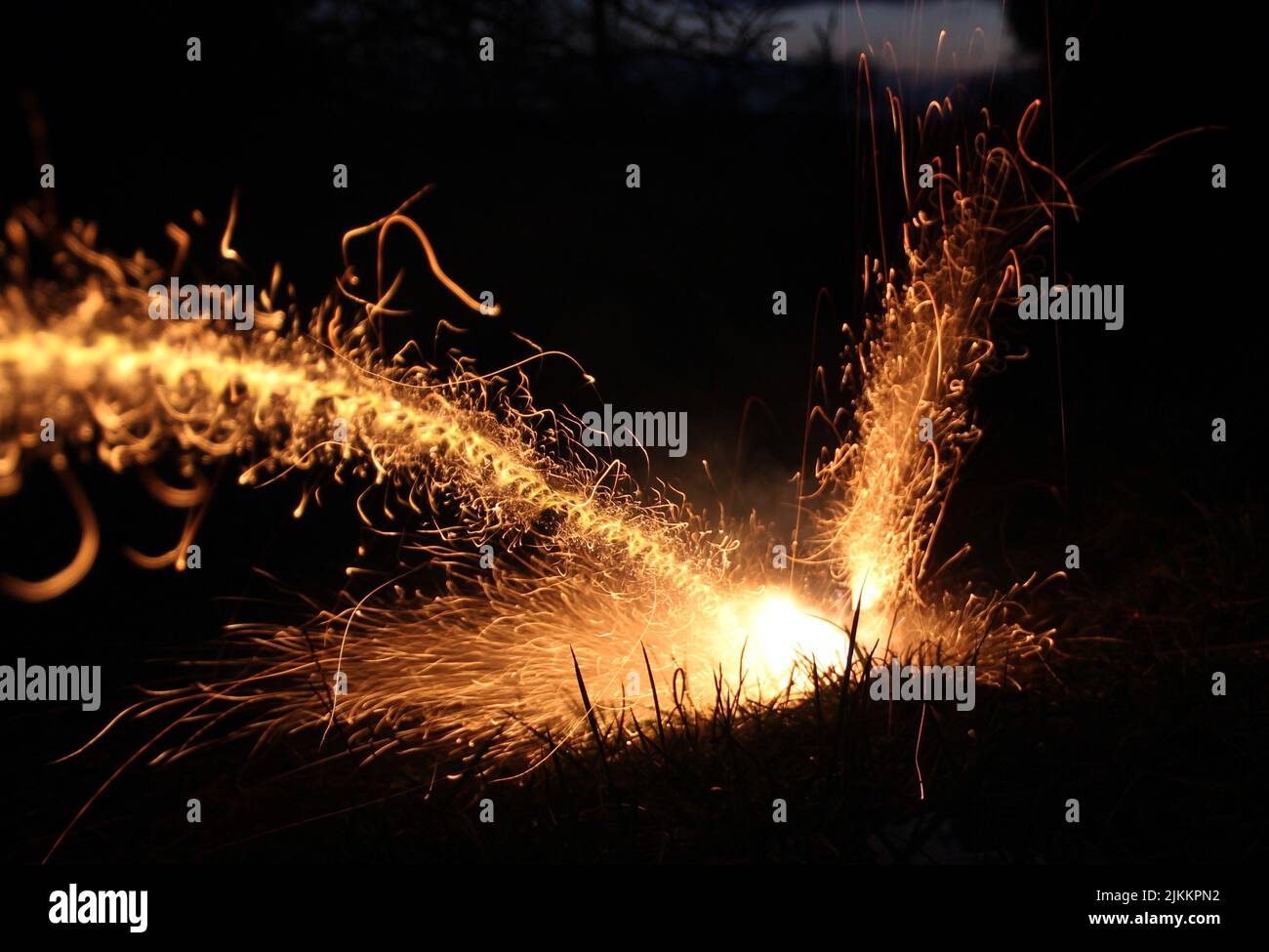 A mesmerizing view of pyrotechnic fire with the reflection on the ...