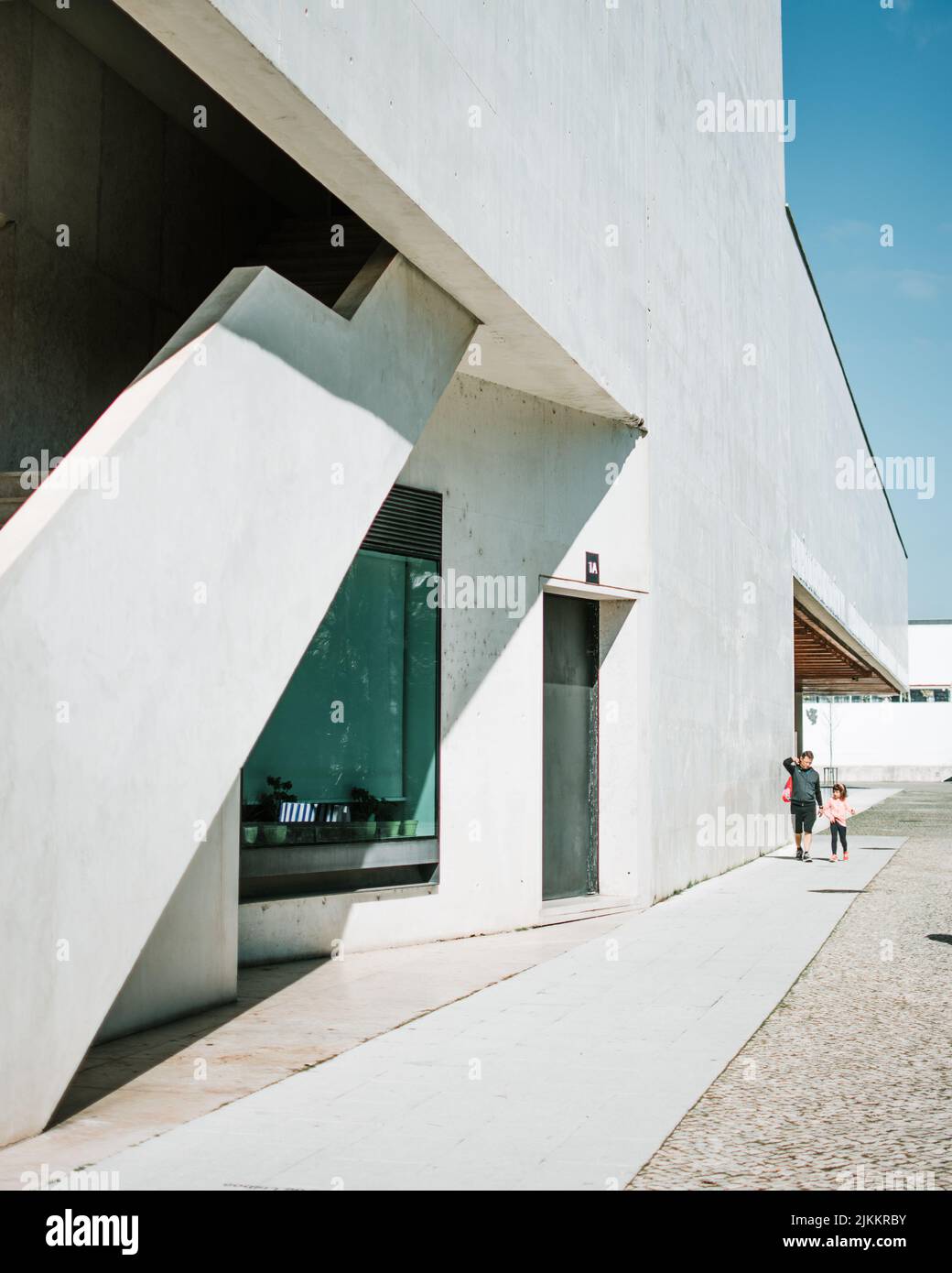 An architecture with leading lines in Portugal and father and daughter ...