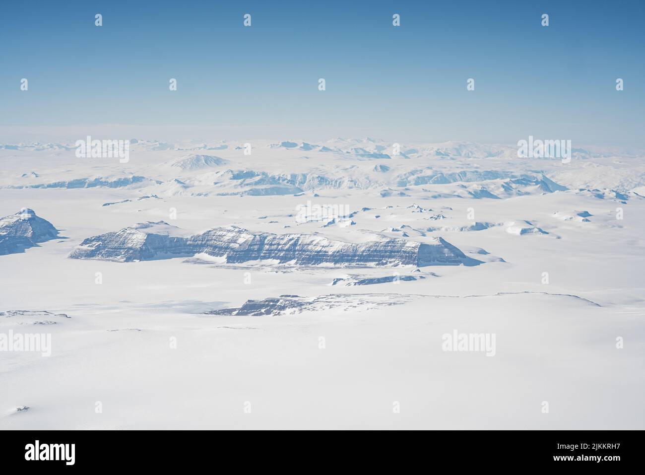 An aerial view of white mountains in Antarctica Stock Photo - Alamy