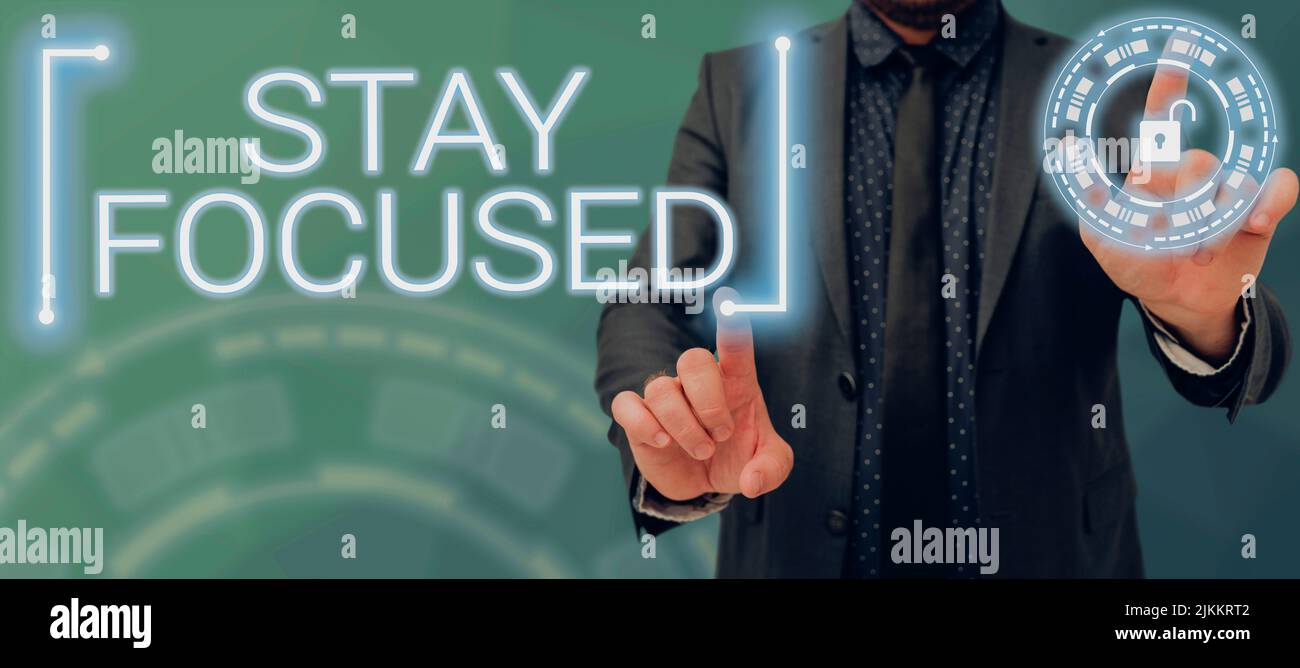 Hand writing sign Stay Focused. Word for Be attentive Concentrate Prioritize the task Avoid ...