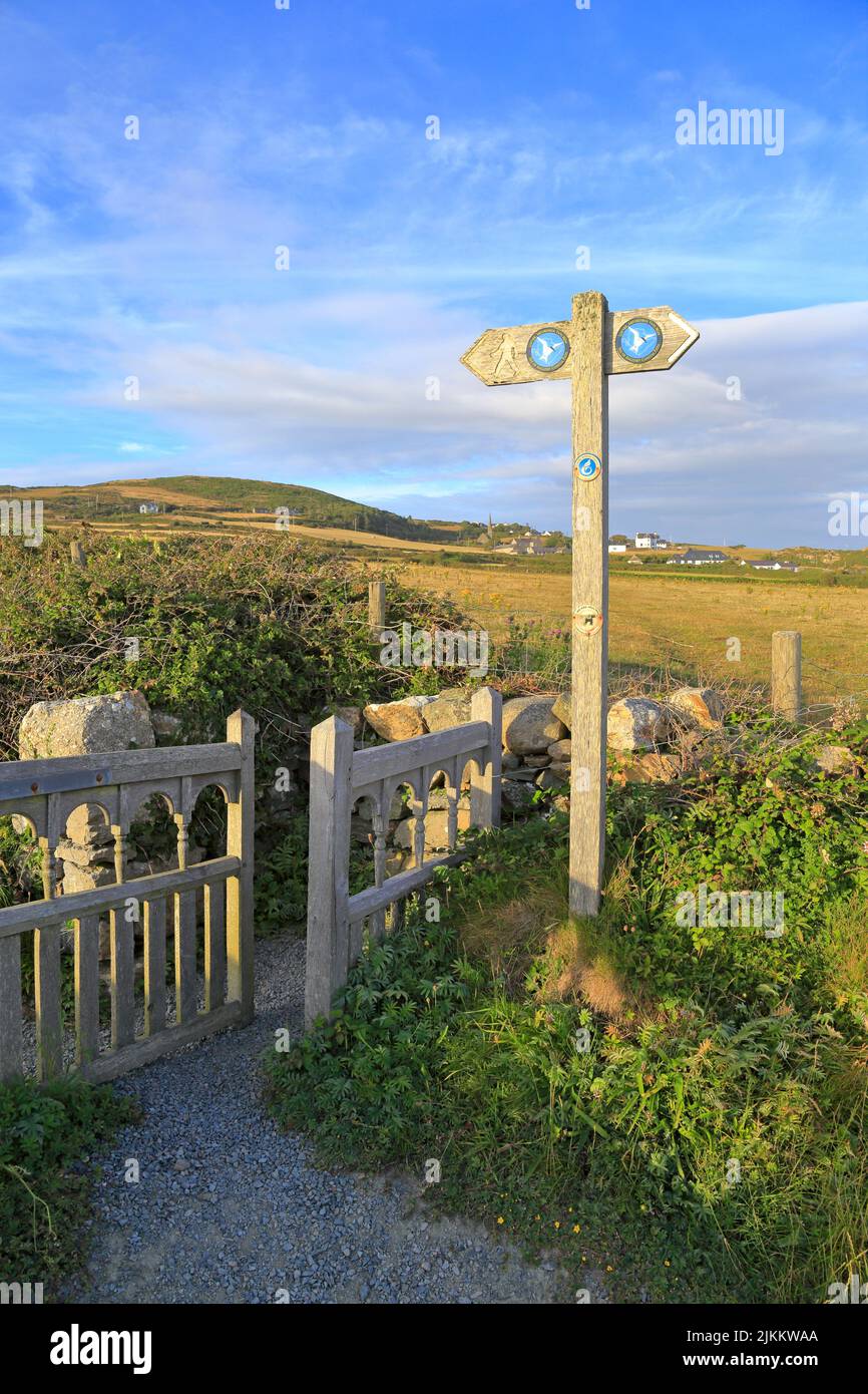 Anglesey Coastal Path and Wales Coast Path fingerpost in Church Bay ...