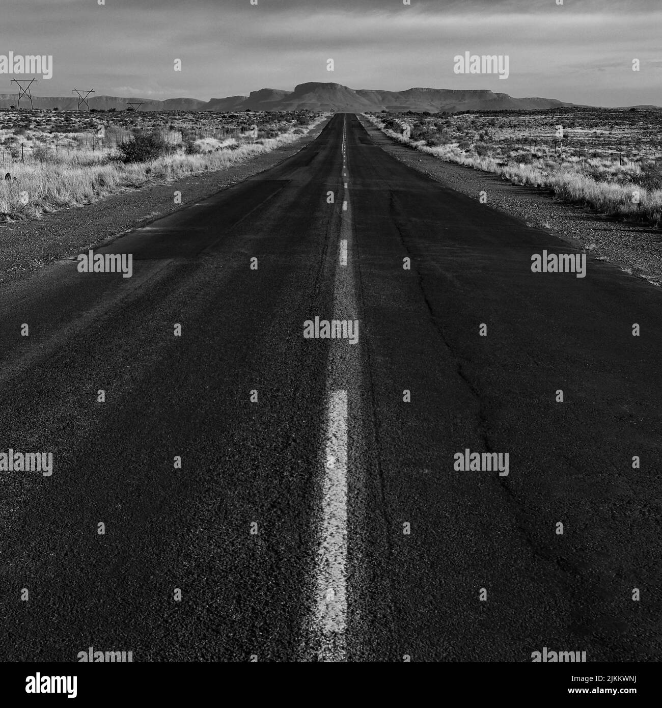Empty road cloudy sky Black and White Stock Photos & Images - Alamy