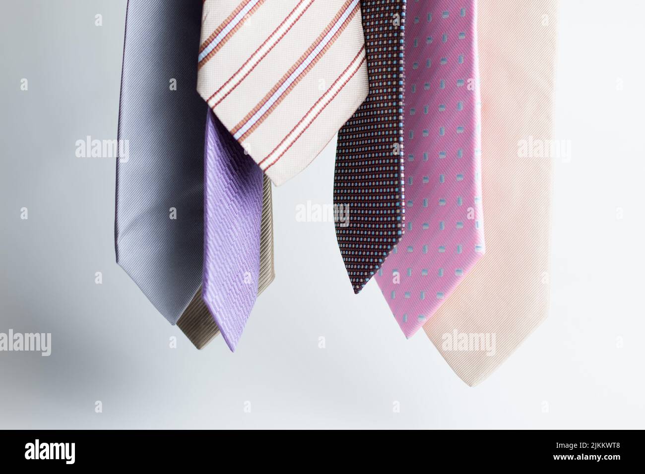 Hanging ties hi-res stock photography and images - Alamy
