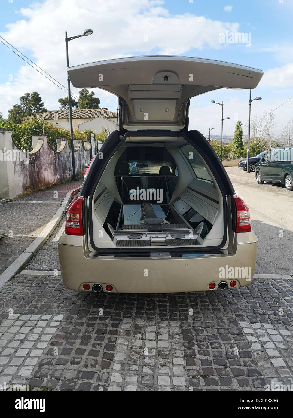 a vertical shot of open and empty modern hearse Stock Photo - Alamy