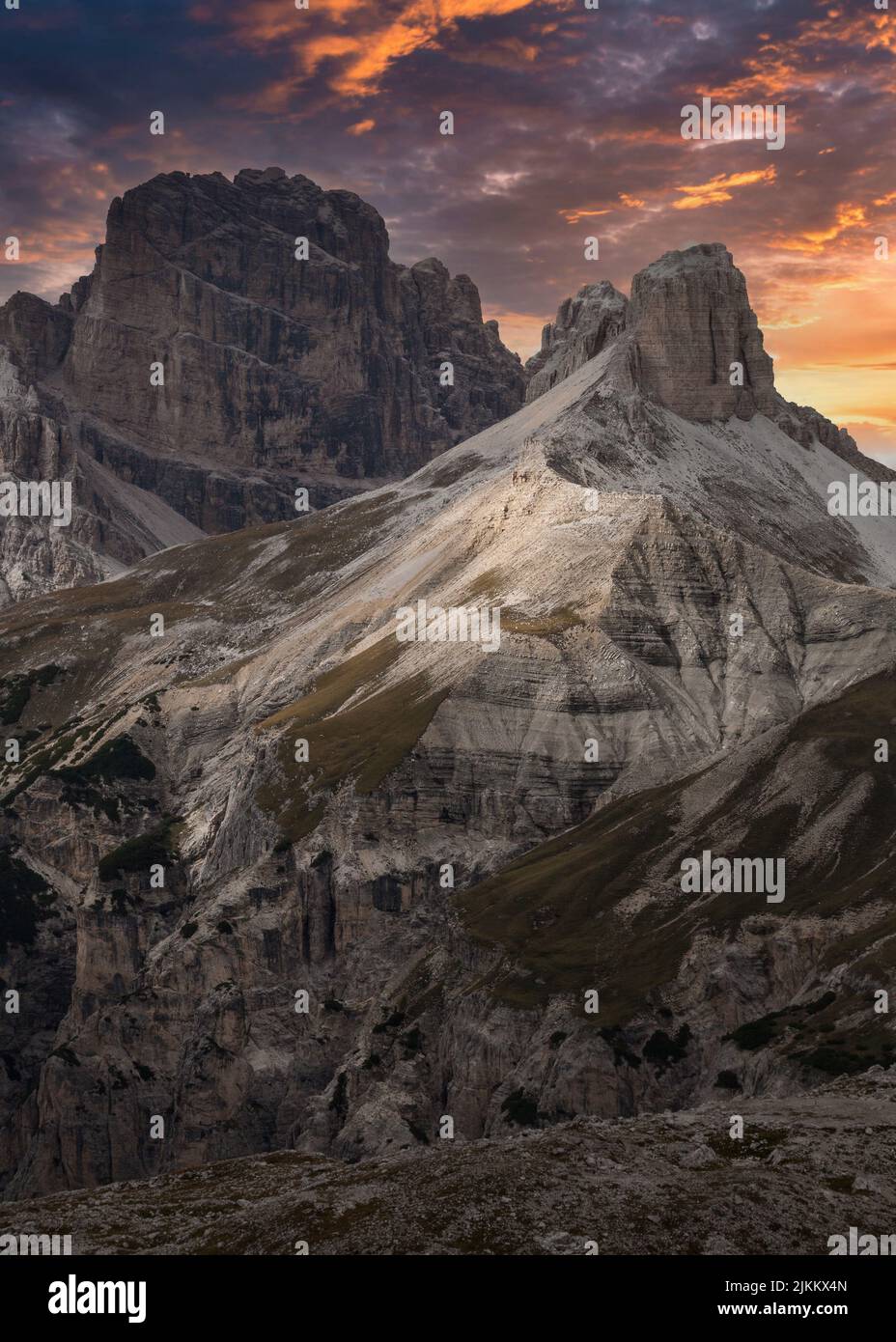 Mountain range. Hiking in the Dolomites with light and shadows, cloudy ...