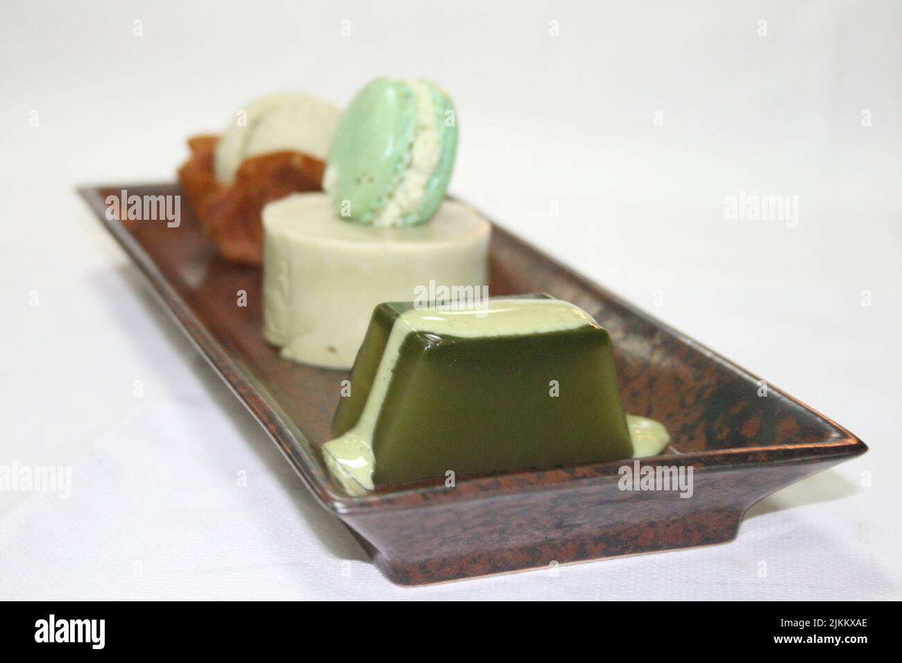 A closeup of delicious desserts with a white background Stock Photo - Alamy