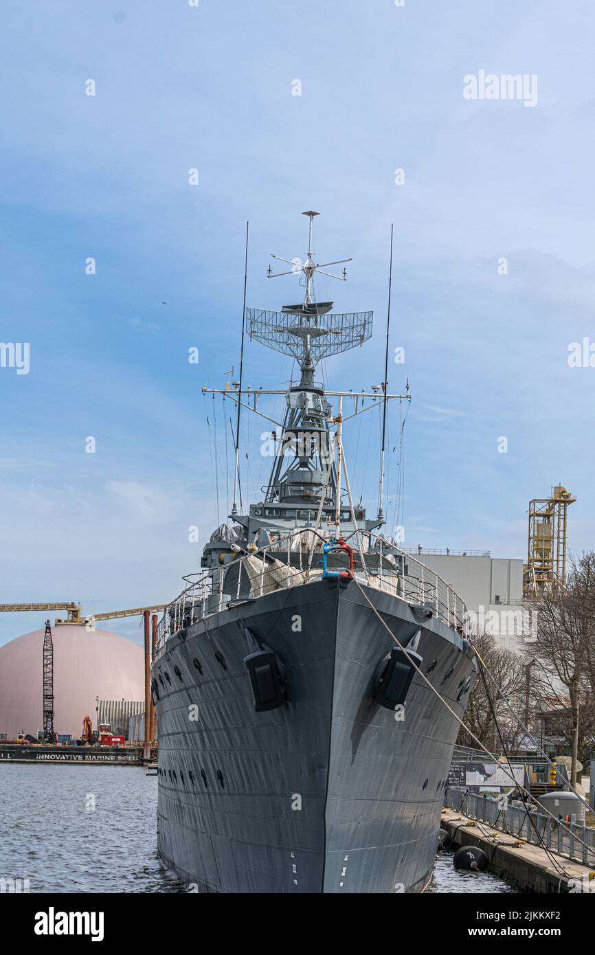 A beautiful shot of World war two warship against blue sky on a sunny ...
