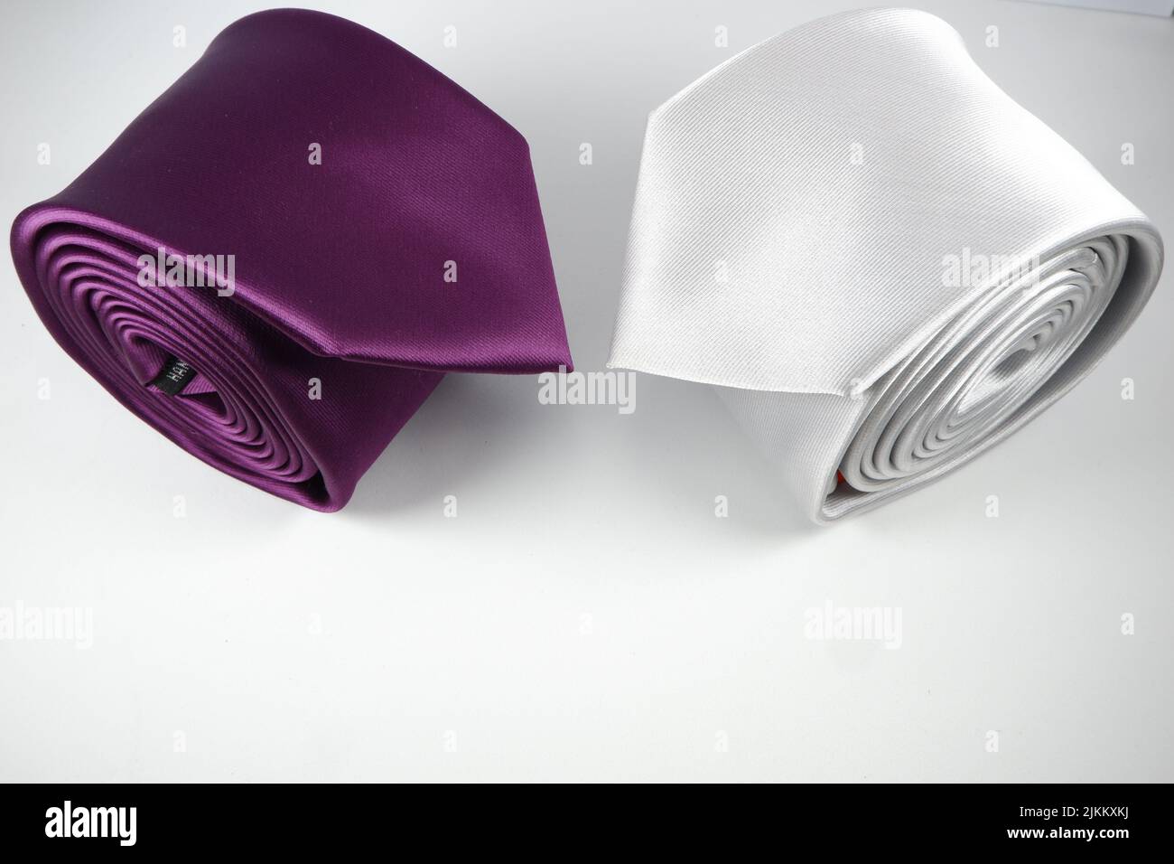Two men tie hi-res stock photography and images - Alamy