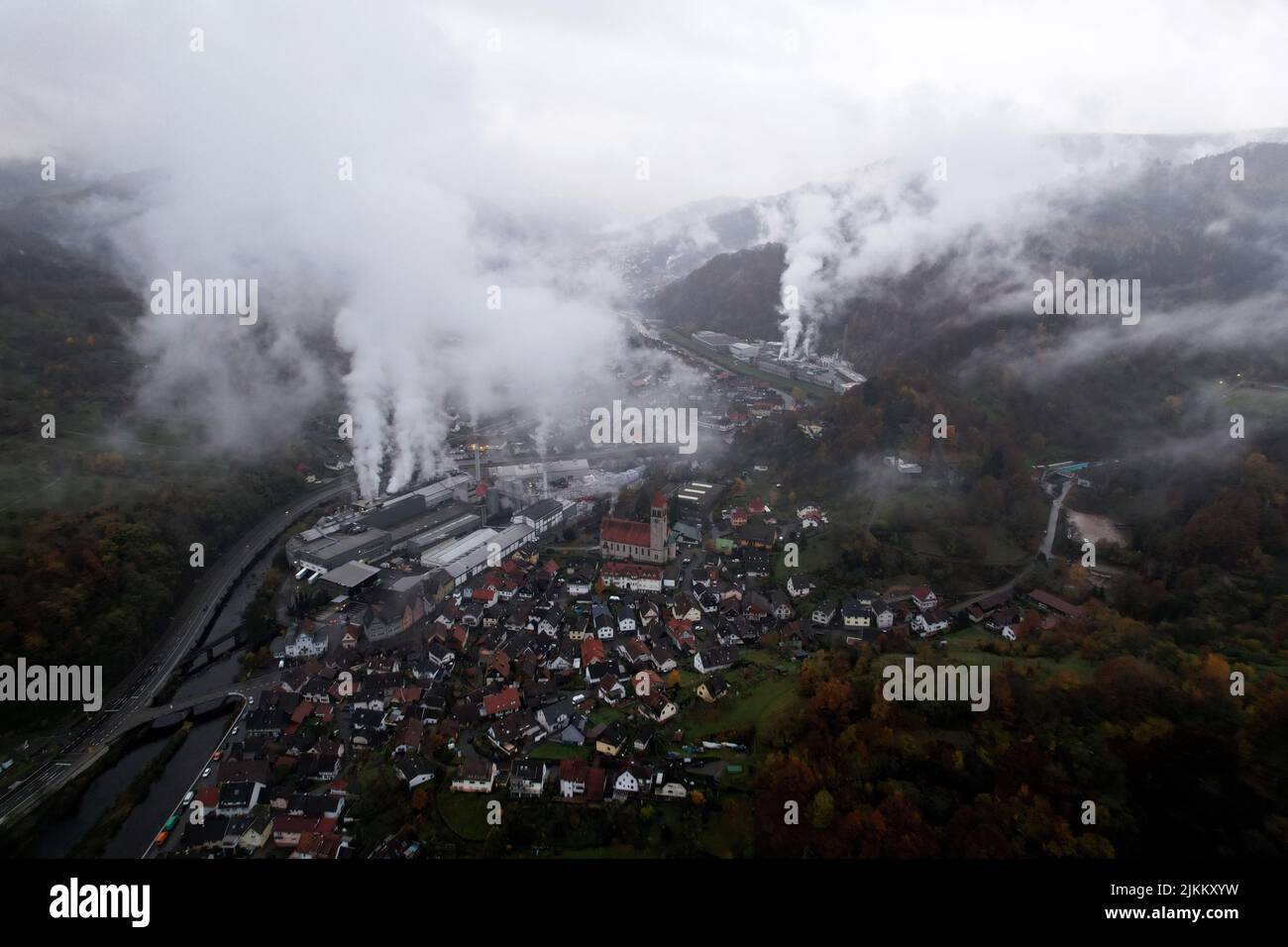 An aerial view of smoke from factory chimneys on a German valley Stock ...