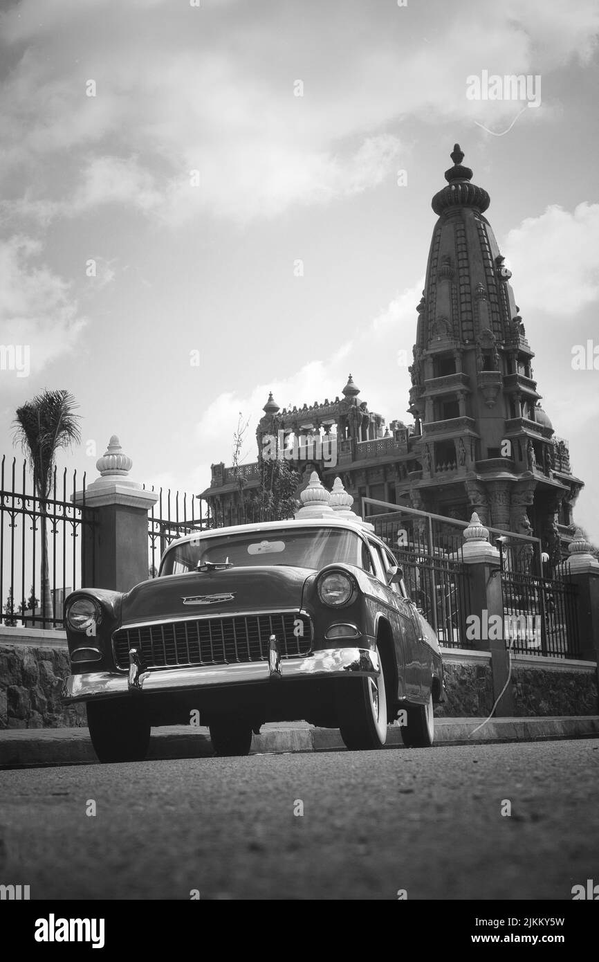 A grayscale of a classic car parked on a street Stock Photo - Alamy