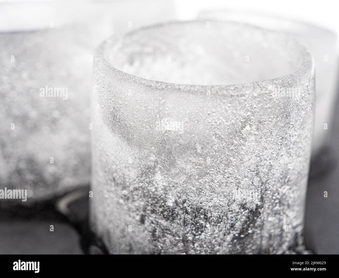 A selective shot of glasses made of ice for cold drinks Stock Photo - Alamy