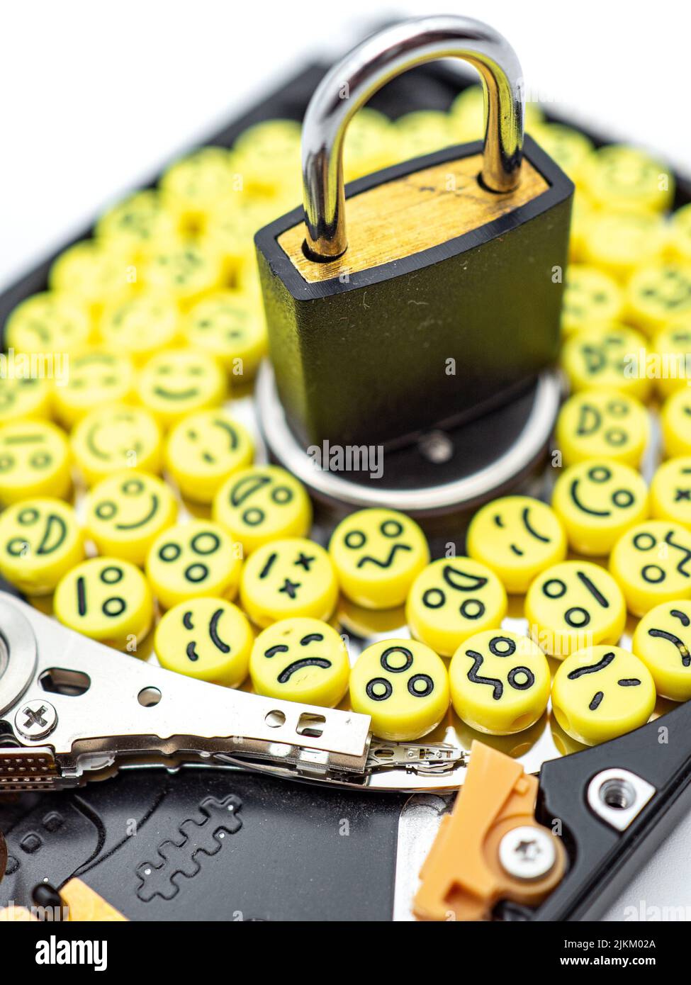A close-up shot of a metal lock against a background of yellow ...