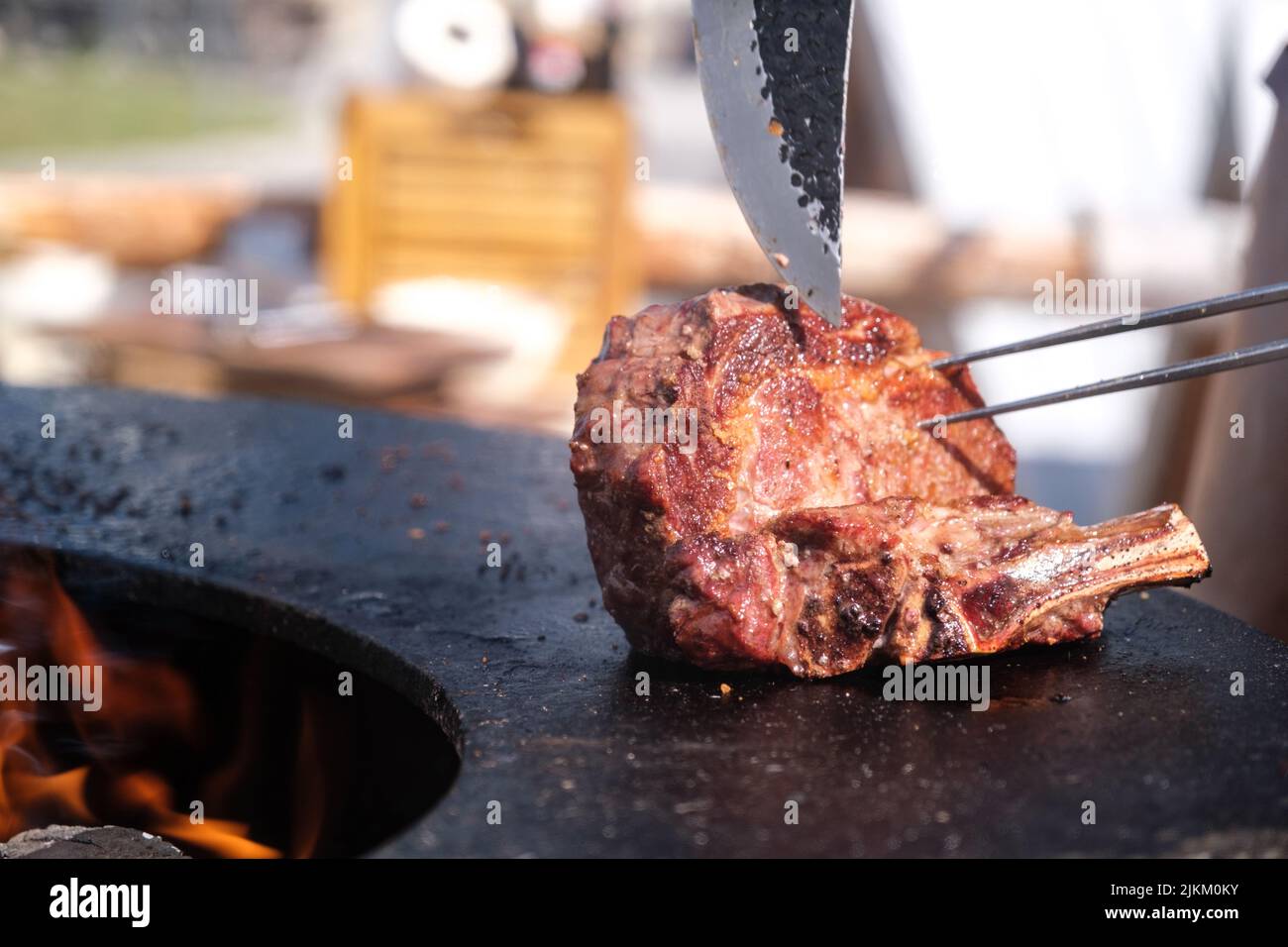 The process of preparing a barbecue next to the fire Stock Photo - Alamy