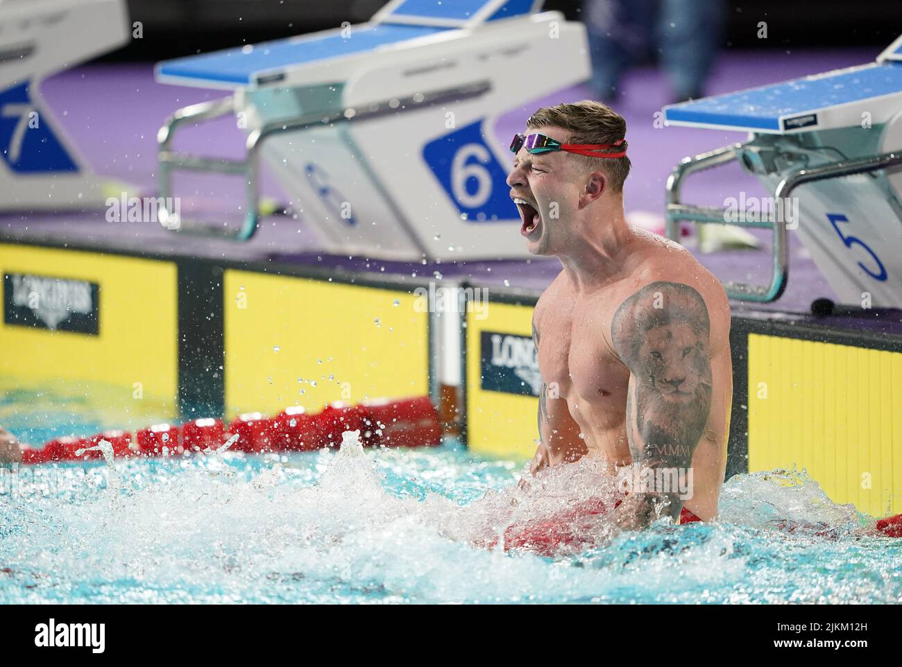 England's Adam Peaty after winning gold in the Men's 50m Breaststroke ...