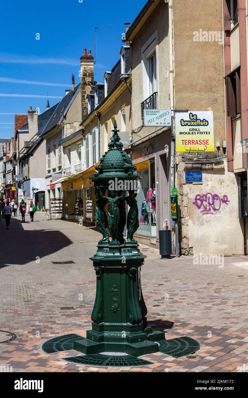 An outdoor view of the streets and historical buildings in Bourges ...