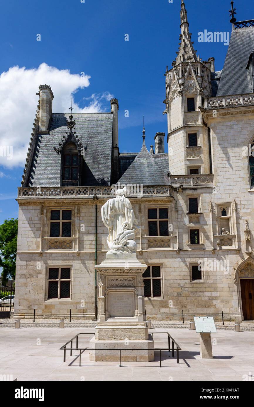 The famous Jacques Coeur's statue in front of a building in Bourges ...