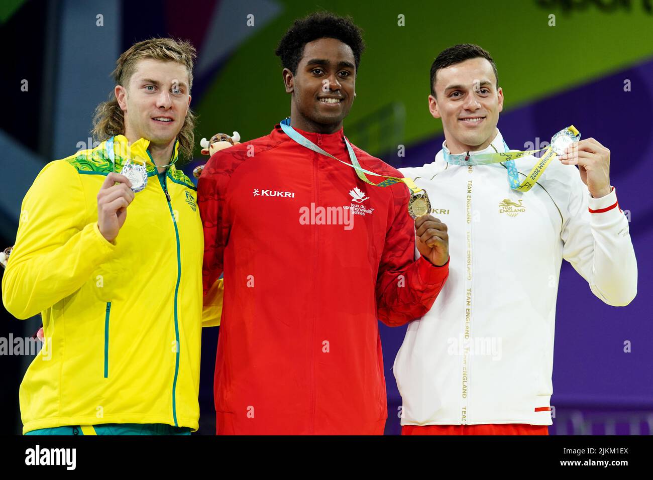 England’s James Guy with his joint Silver Medal (right), Australia’s ...