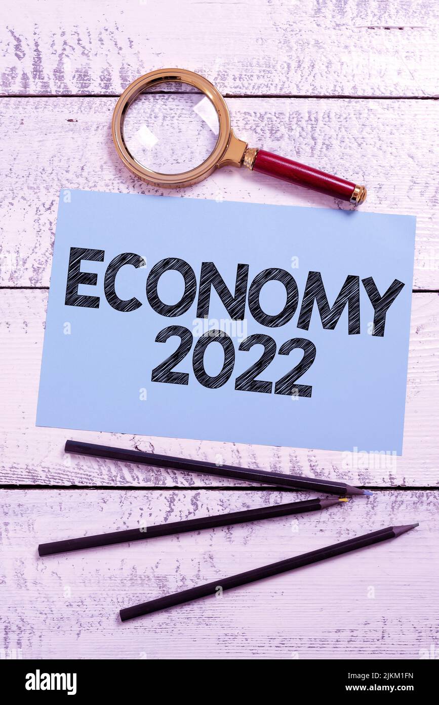 Writing displaying text Economy 2022. Concept meaning State of wealth ... Writing displaying text Economy 2022. Concept meaning State of wealth ...