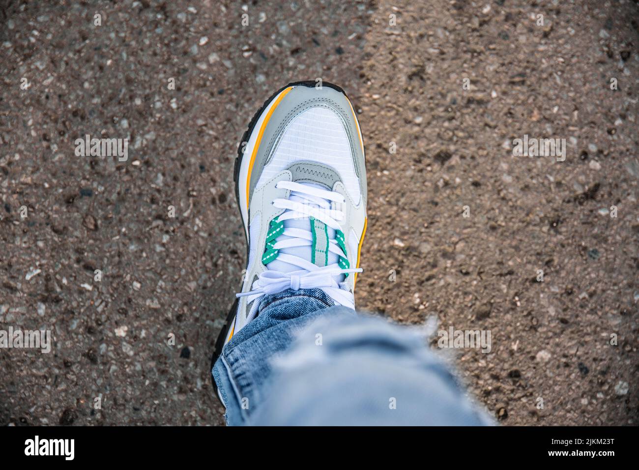 A top view of a male walking on the street wearing his brand new ...